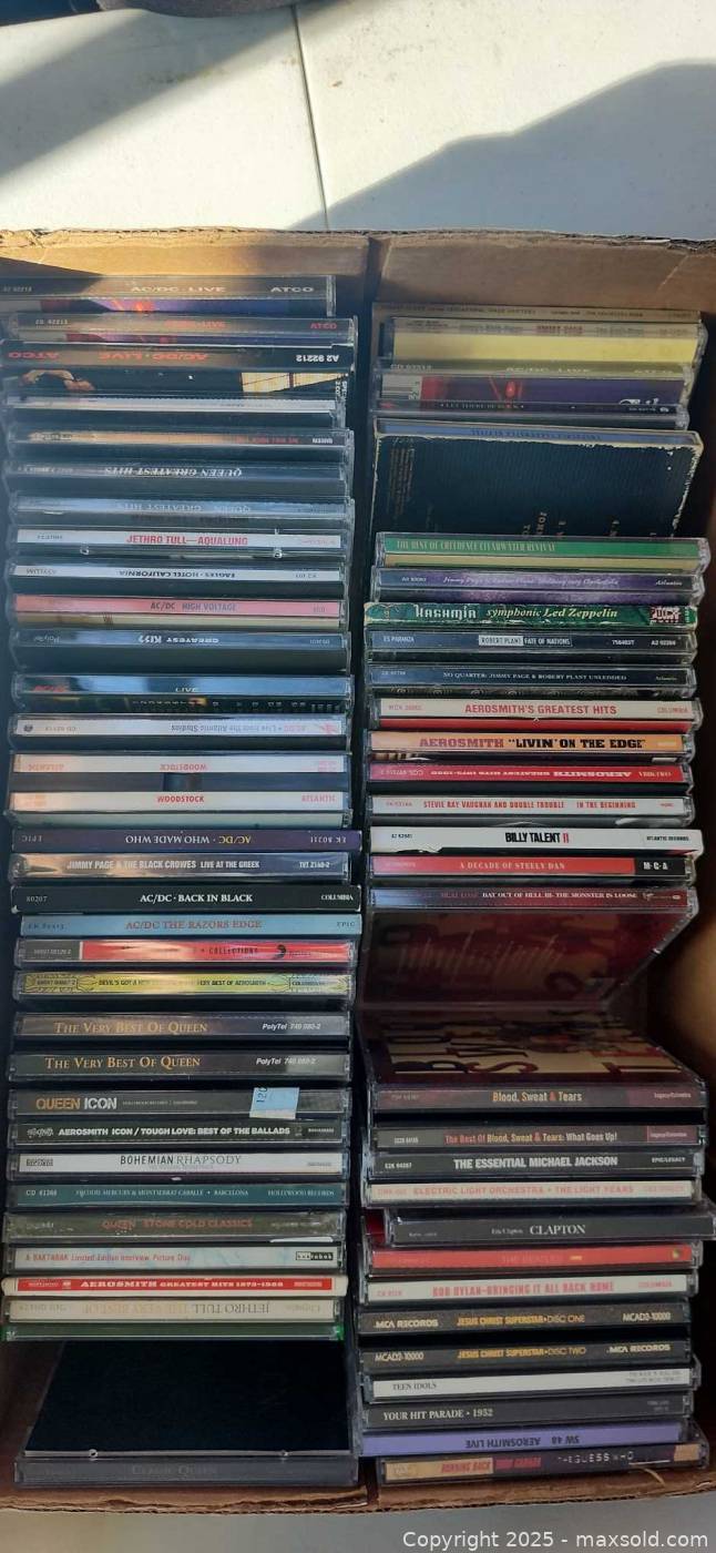 Five boxes of music CDs | Maxsold
