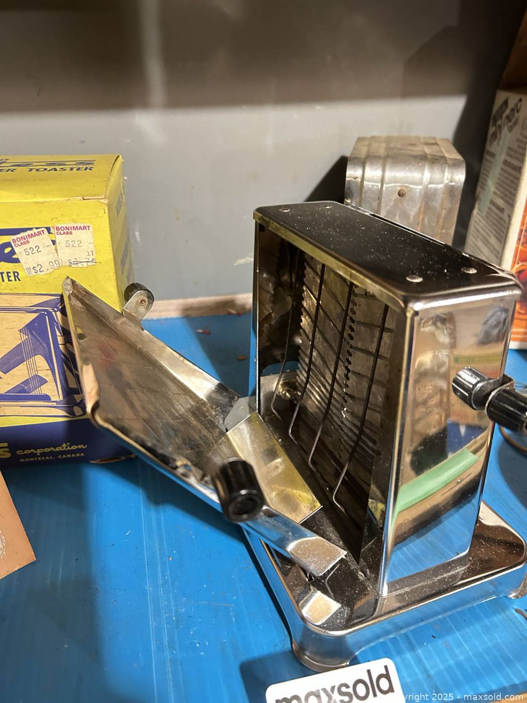 Metal lunch boxes, alarm clock, lantern, chrome toasters and assorted ...