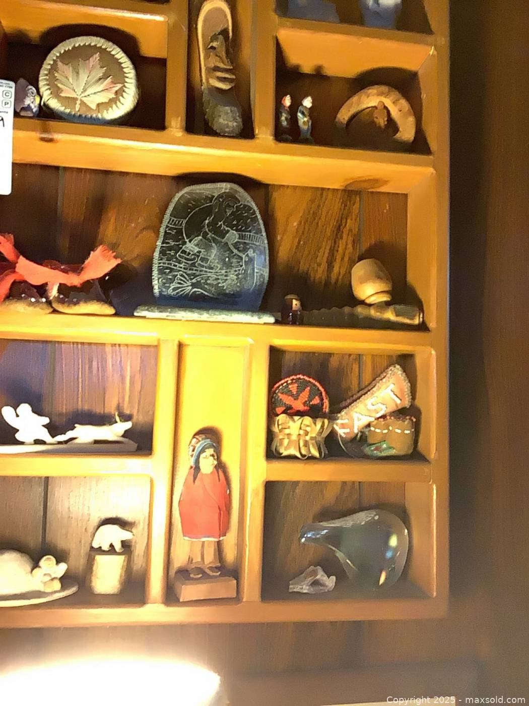 Wooden display shelf with Canadiana miniatures | Maxsold
