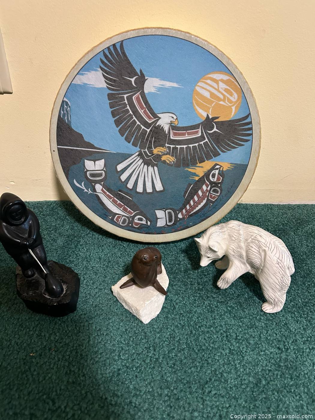 Haida-style Clarence A. Wells drum, Boma Inuit hunter figure and animal ...