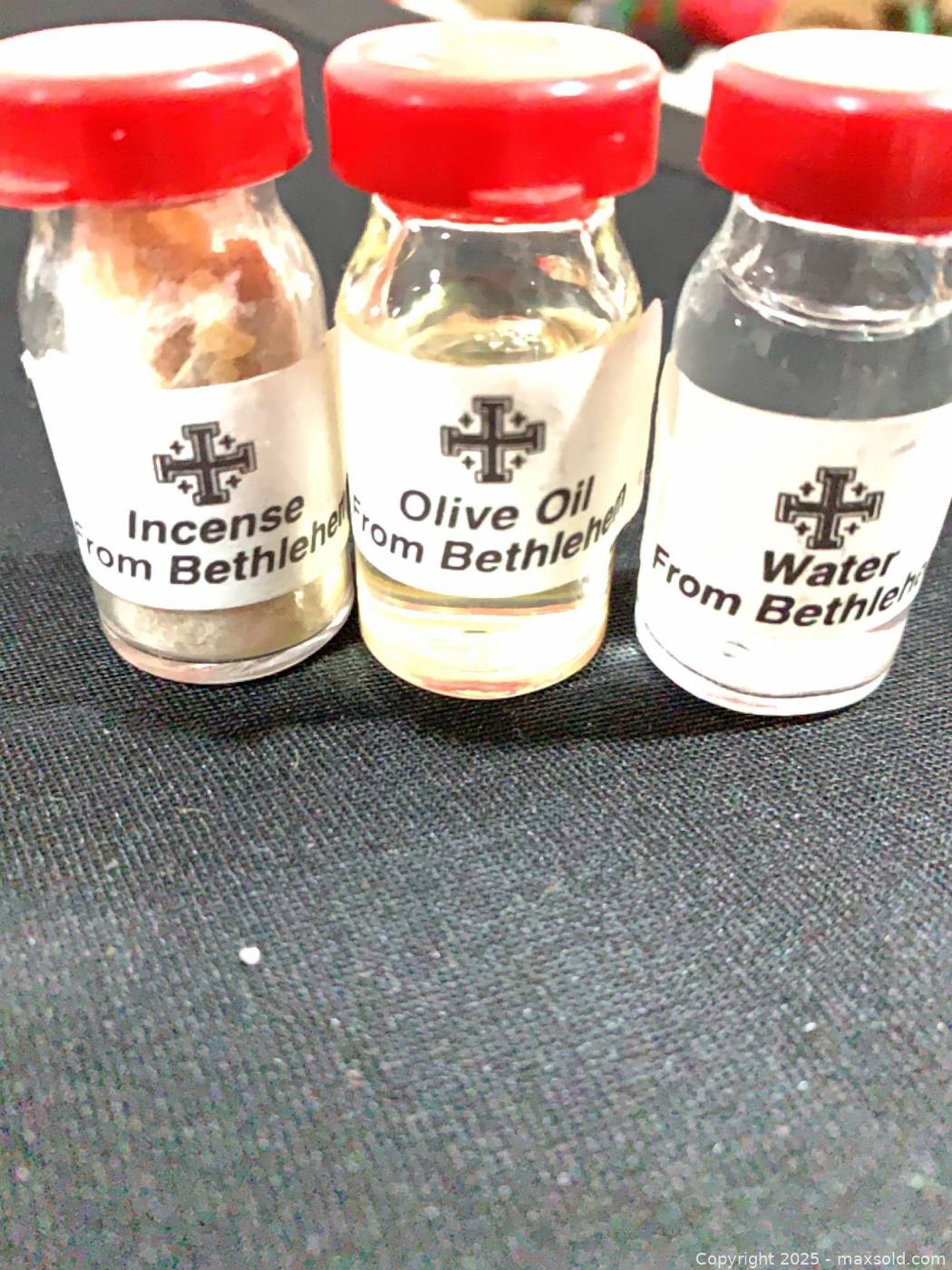 Catholic pocket manual, rosary, Bethlehem vials | Maxsold
