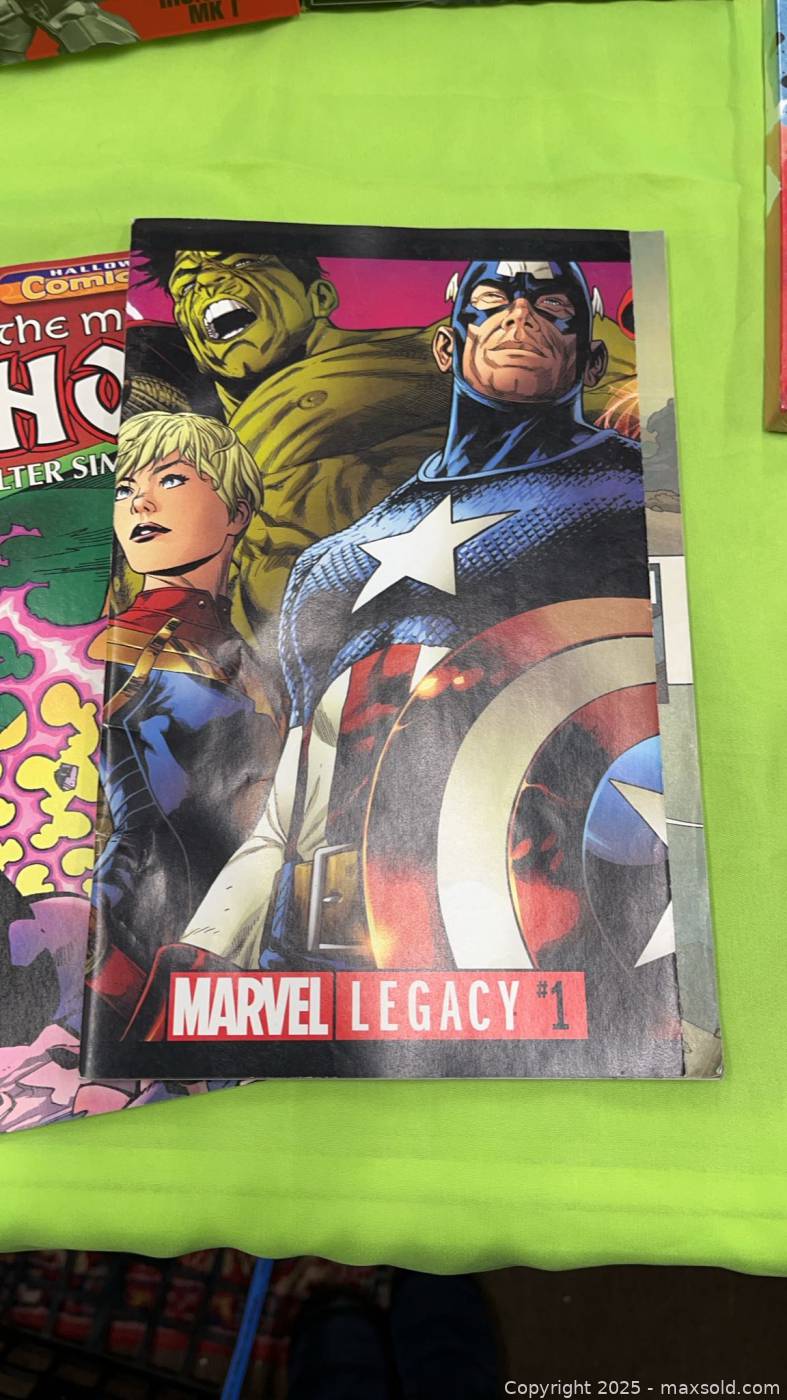 Marvel action figures, comics, art and keychains | Maxsold