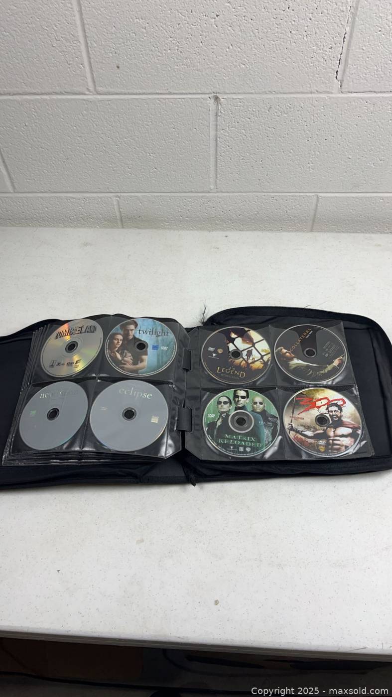 DVD Movie Binder With 12 Discs | Maxsold