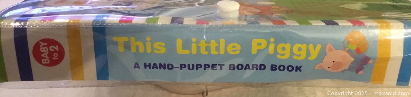 Little Scholastic This Little Piggy hand-puppet board book | Maxsold