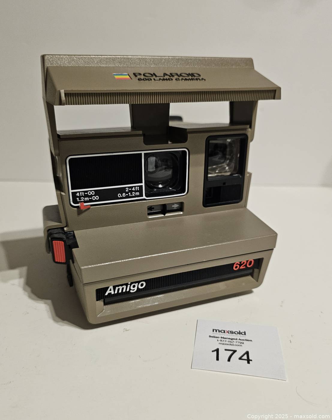 Polaroid Amigo 620 Land Camera | Maxsold
