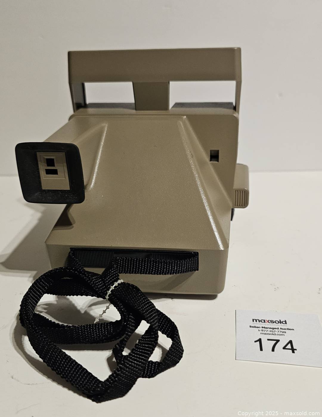 Polaroid Amigo 620 Land Camera | Maxsold
