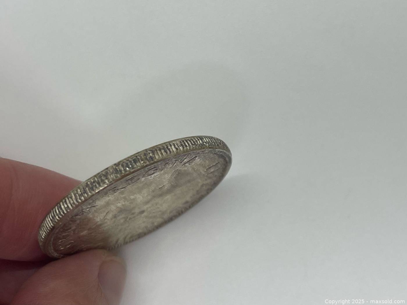 1960 Canadian Silver Dollar Coin | Maxsold