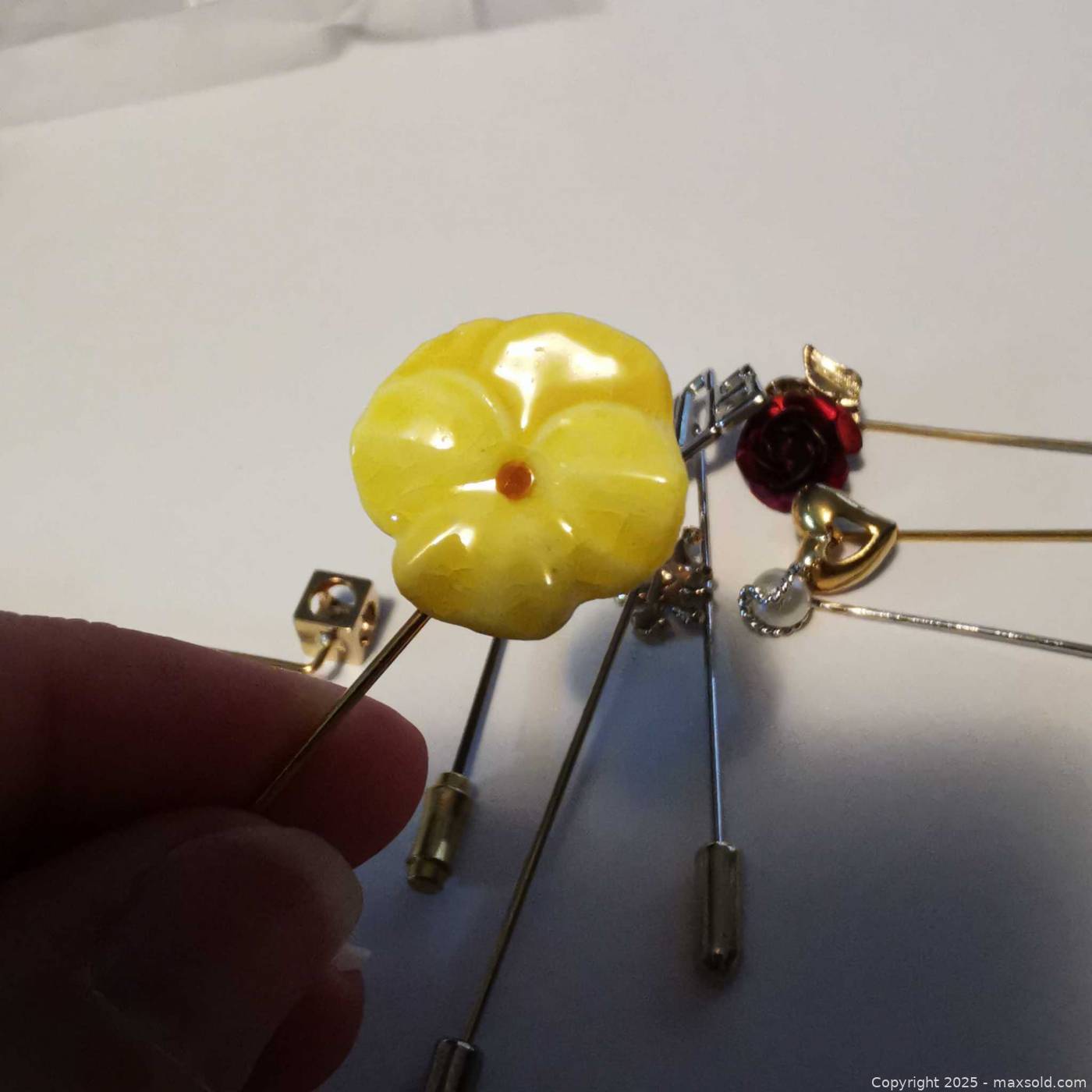 Retro stick pin collection, 7 pieces | Maxsold