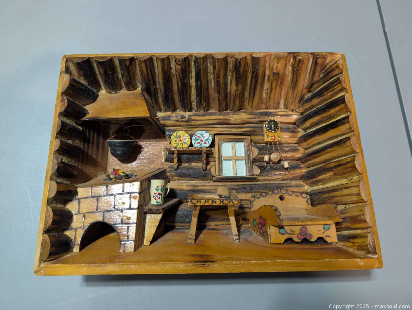 Miniature wooden log-cabin interior diorama | Maxsold