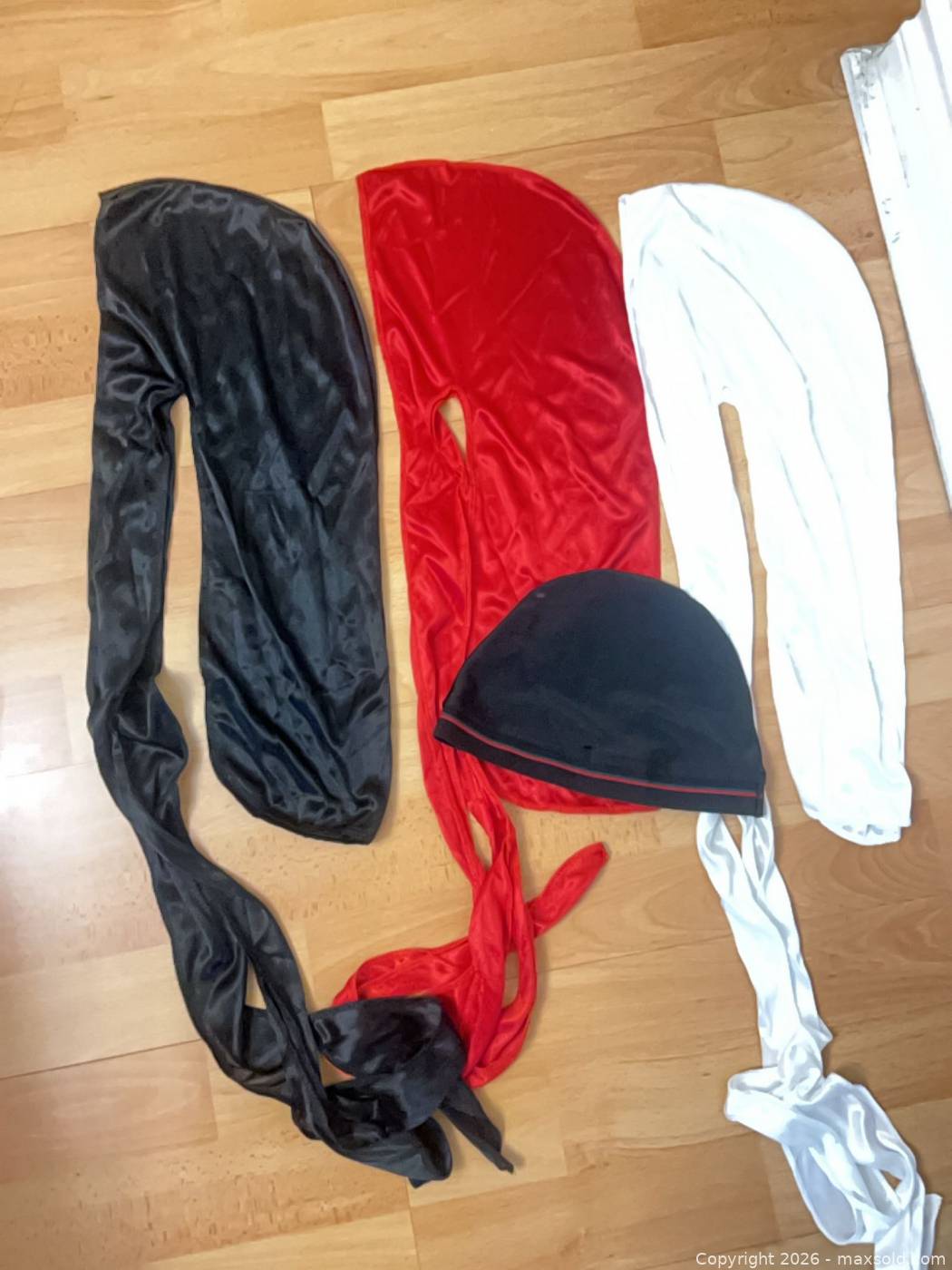 Satin durags and black skull cap | Maxsold