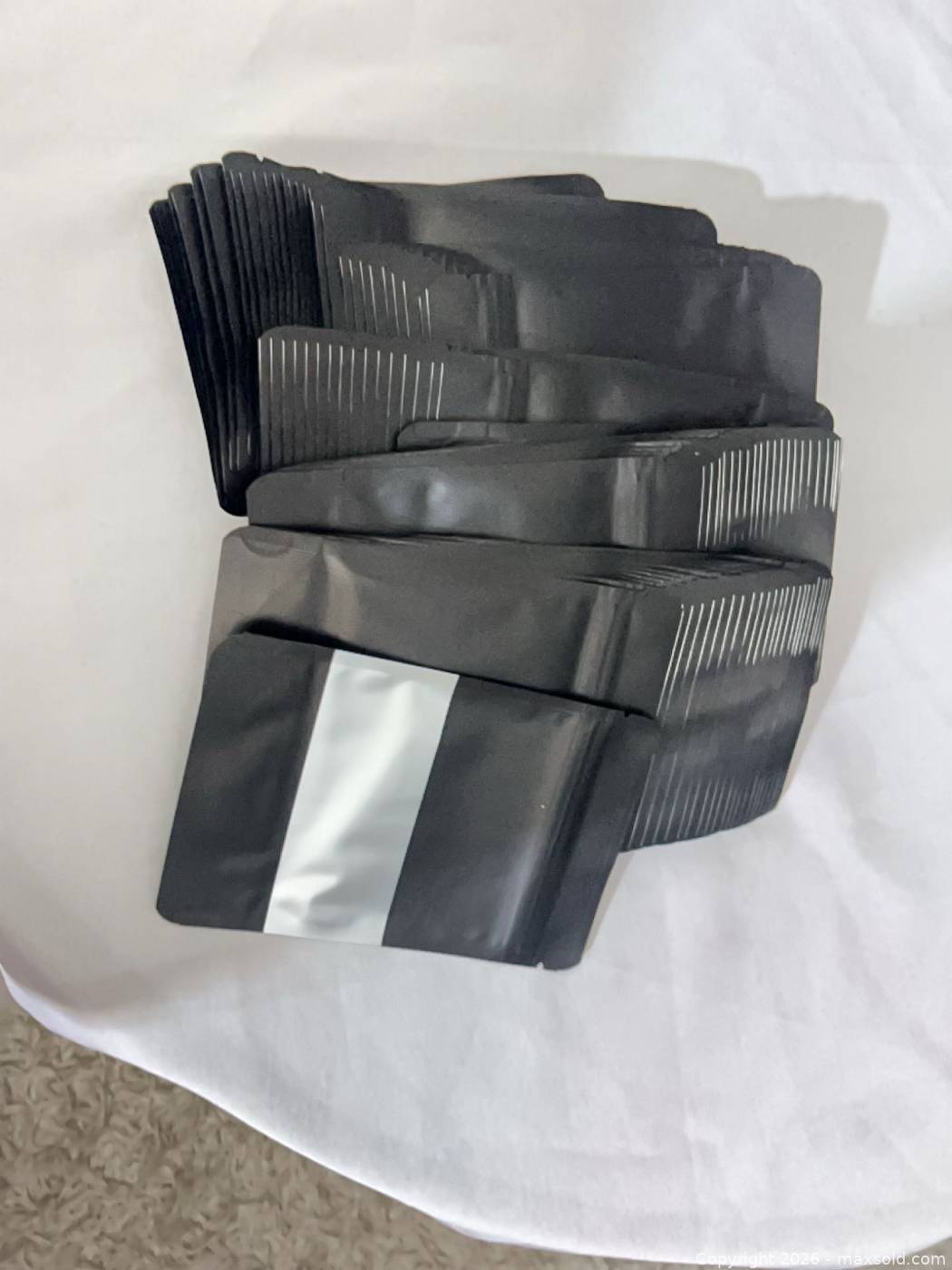 Matte black resealable mylar pouches 50+ | Maxsold