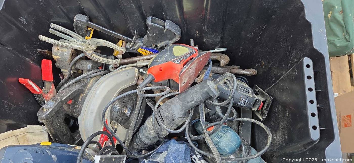 Assorted corded power tools and clamps | Maxsold