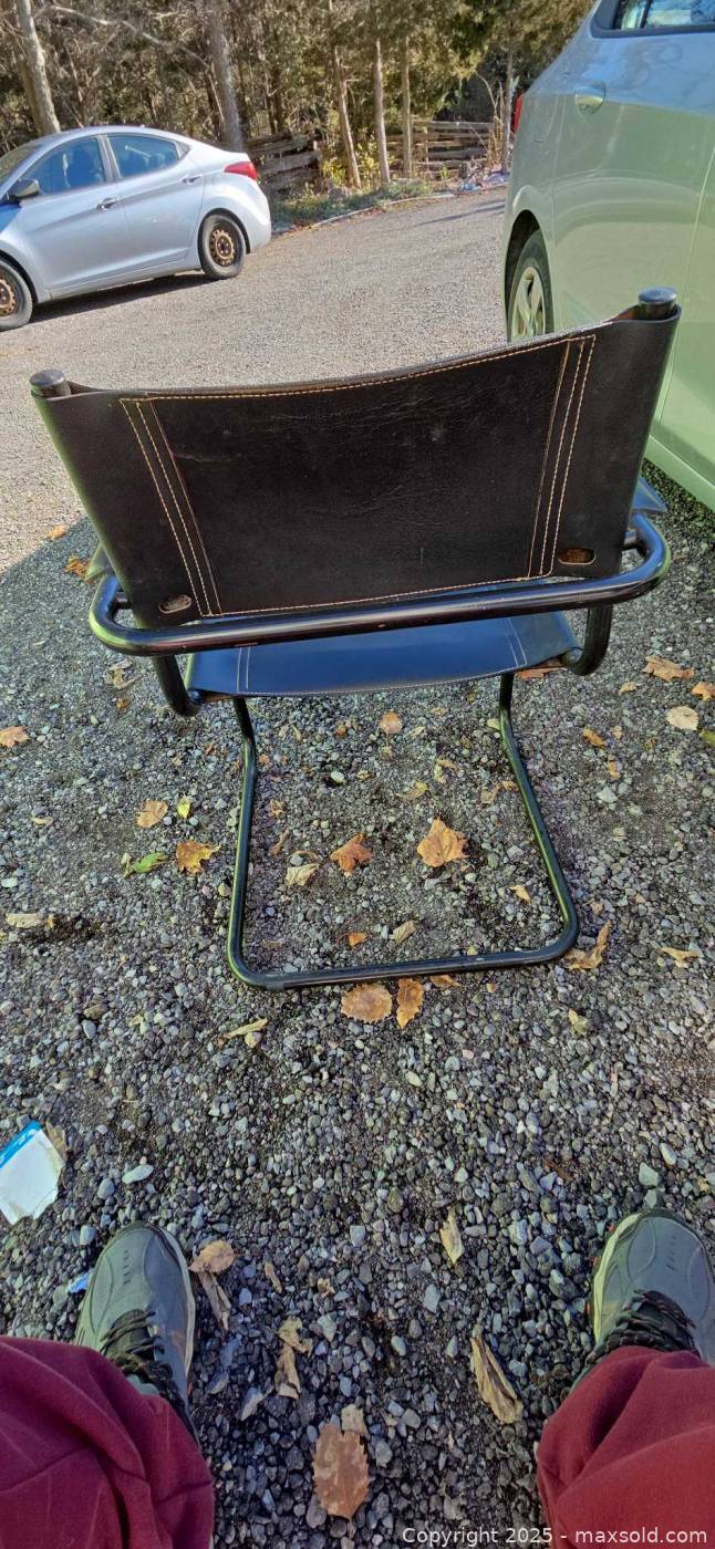 Metal tube frame leather chair | Maxsold