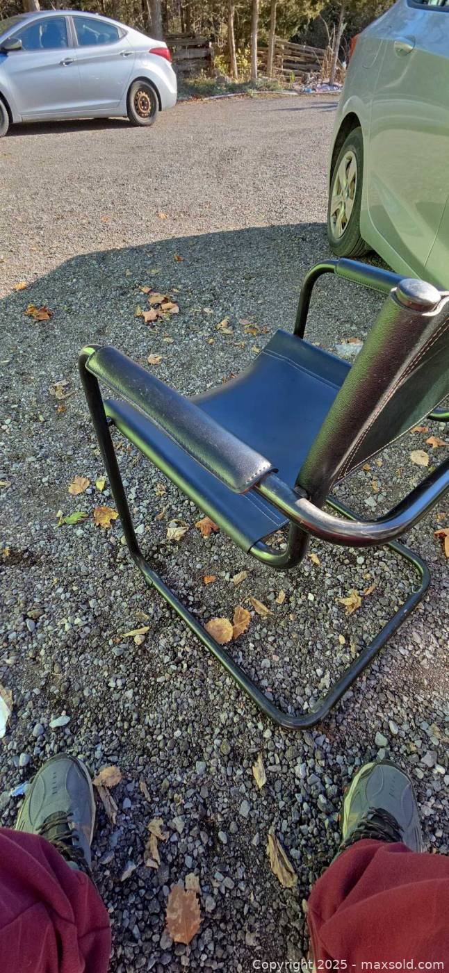 Metal tube frame leather chair | Maxsold