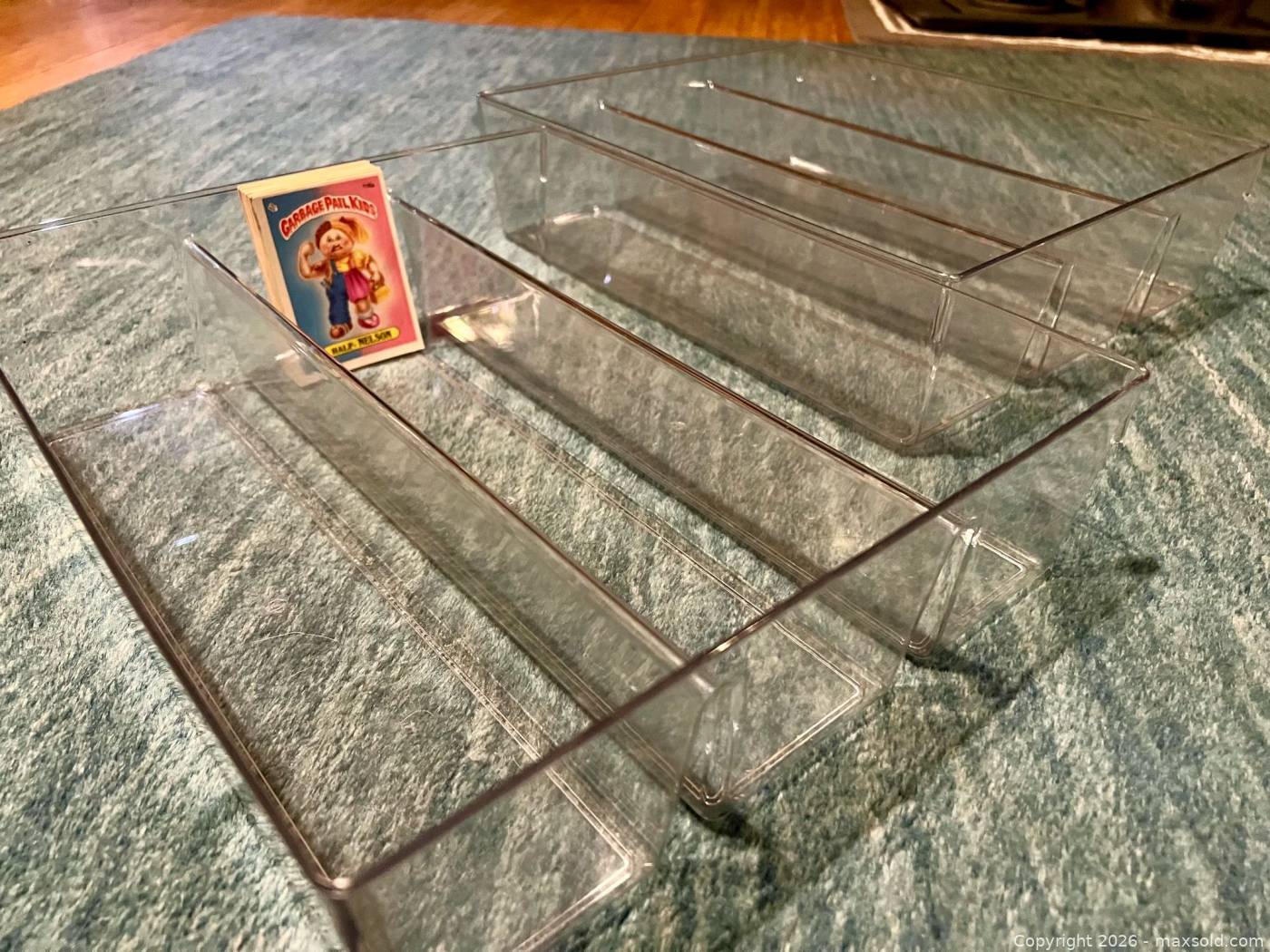 Two clear plastic multi-compartment card display trays | Maxsold