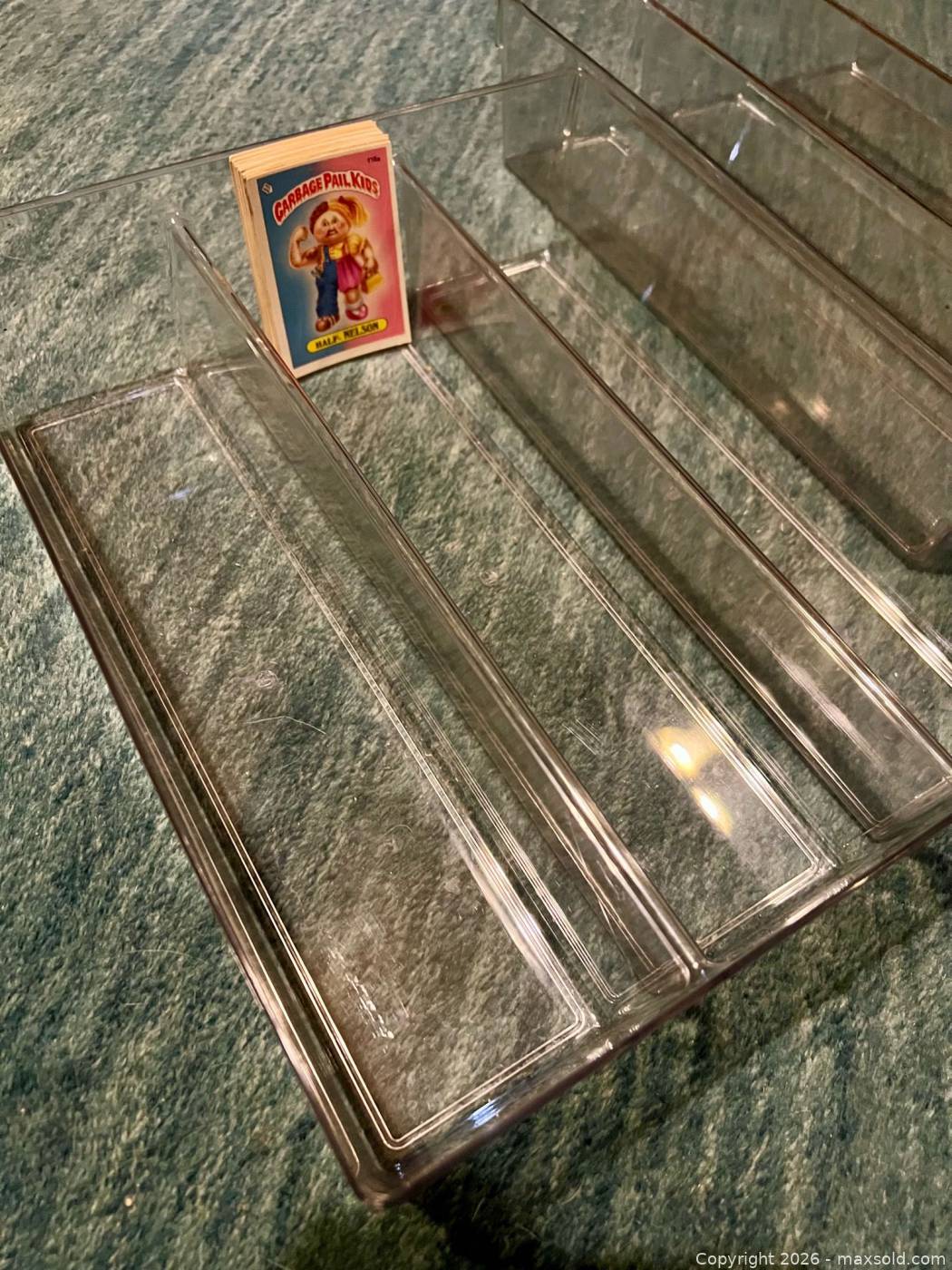 Two clear plastic multi-compartment card display trays | Maxsold