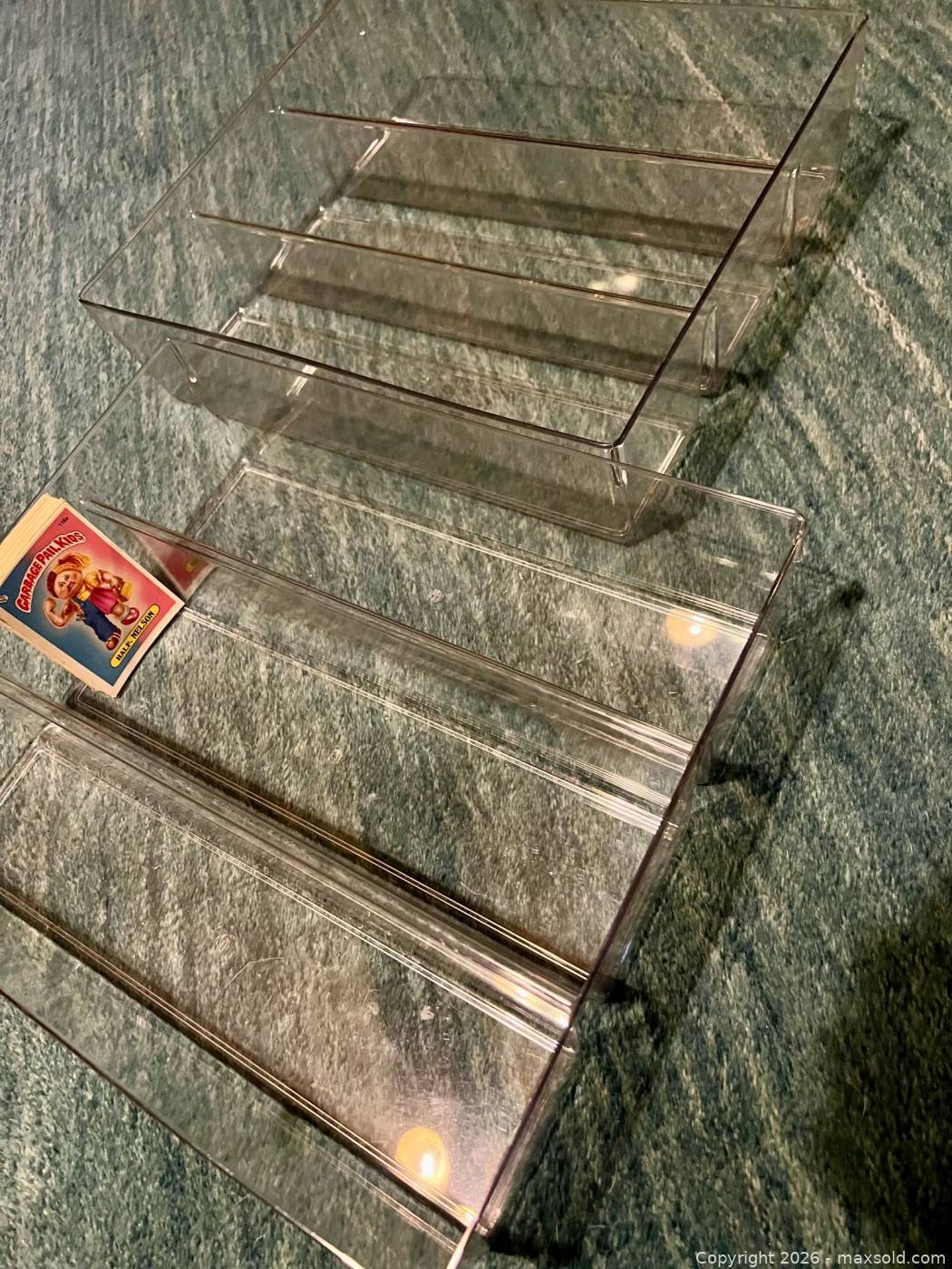 Two clear plastic multi-compartment card display trays | Maxsold