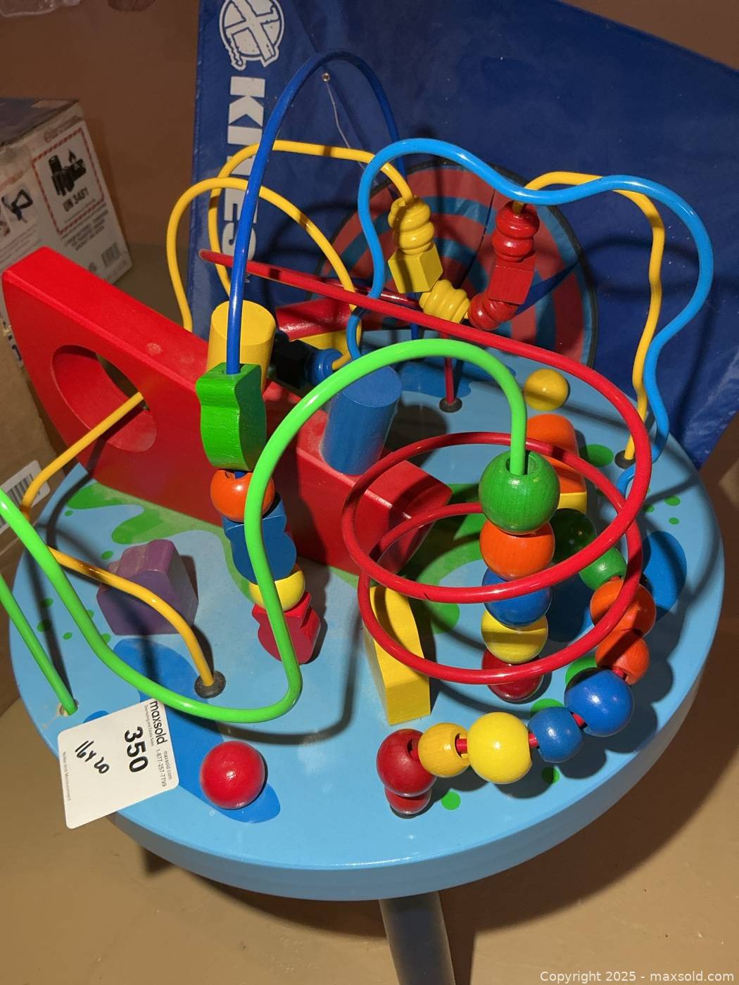 Wooden bead maze activity table and kite | Maxsold