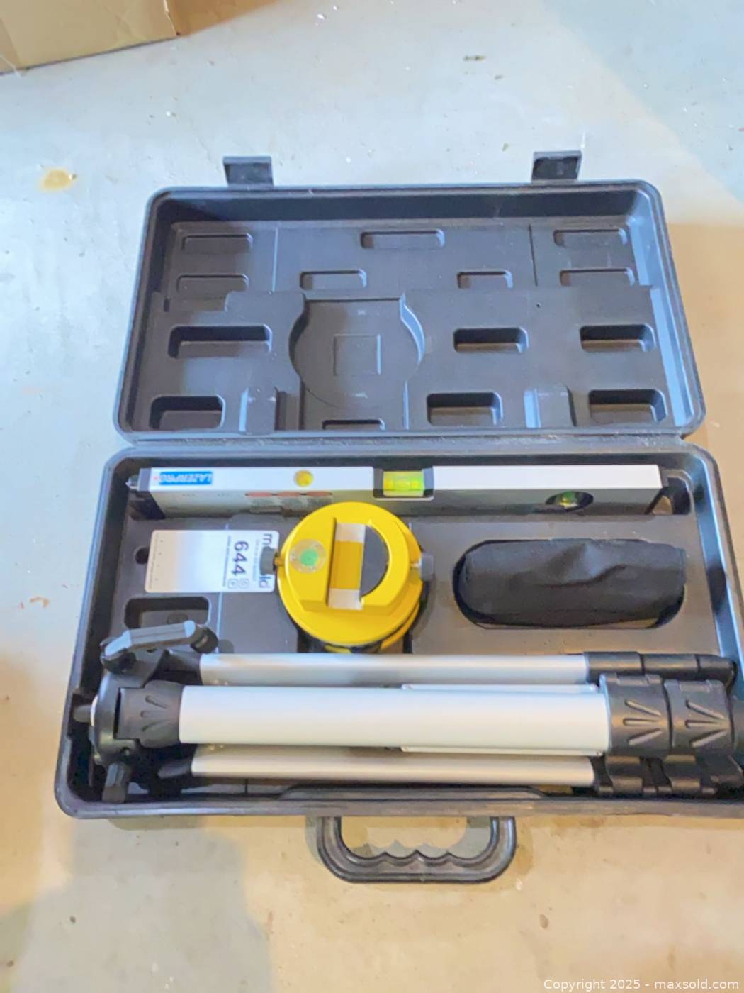 LazerPro laser level kit, tripod, case and Workforce tool bag of assorted hand tools | Maxsold