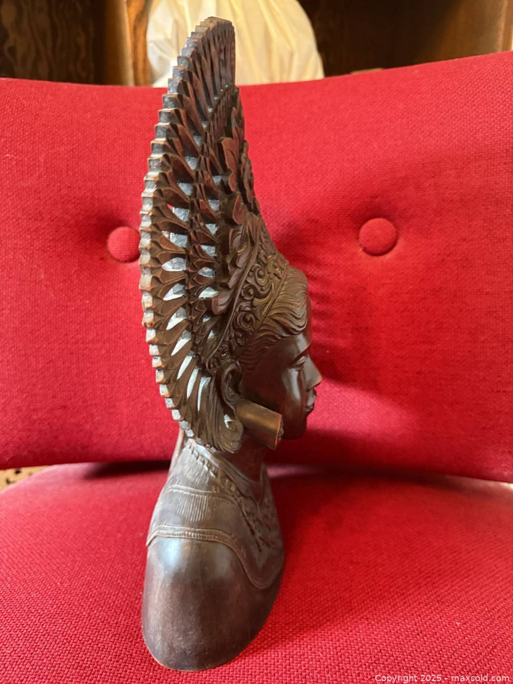 Balinese carved wooden female deity bust | Maxsold