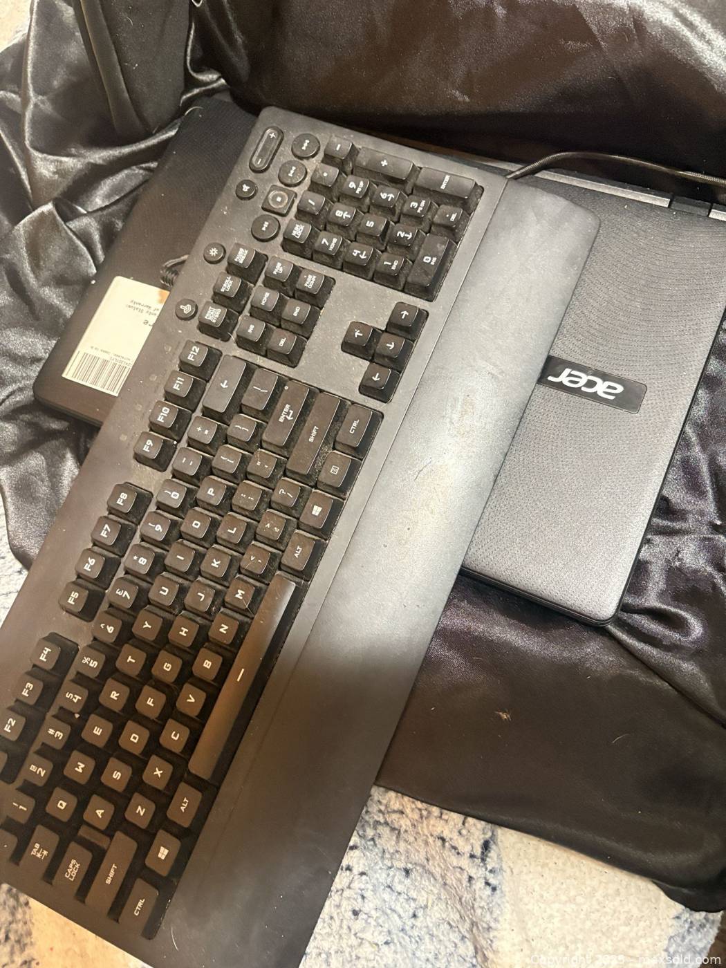 Acer laptop, wired USB keyboard, Kobo reader, Madden NFL 20 PS4 game ...