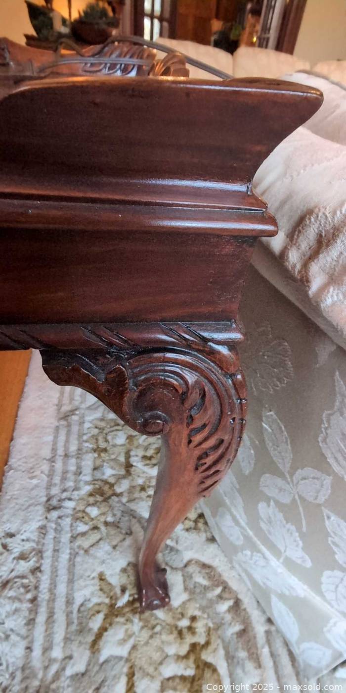 Carved hardwood Chippendale side table | Maxsold