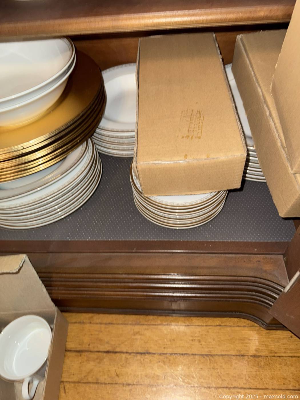 Joshua Maxwell Studio porcelain dinnerware set with 11 gold chargers ...