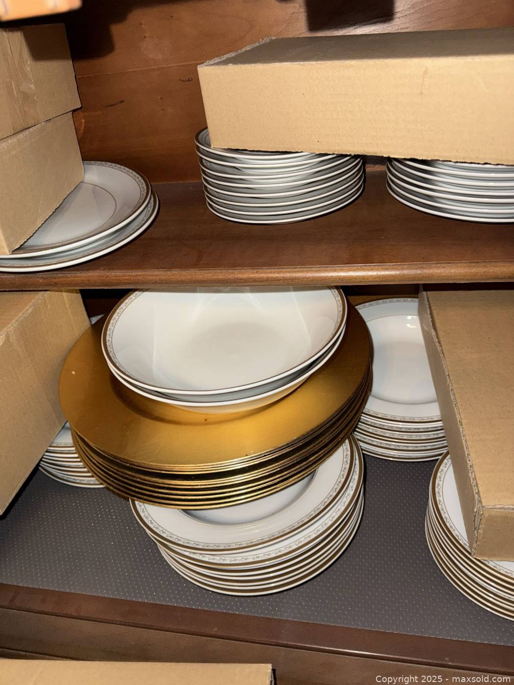 Joshua Maxwell Studio porcelain dinnerware set with 11 gold chargers ...