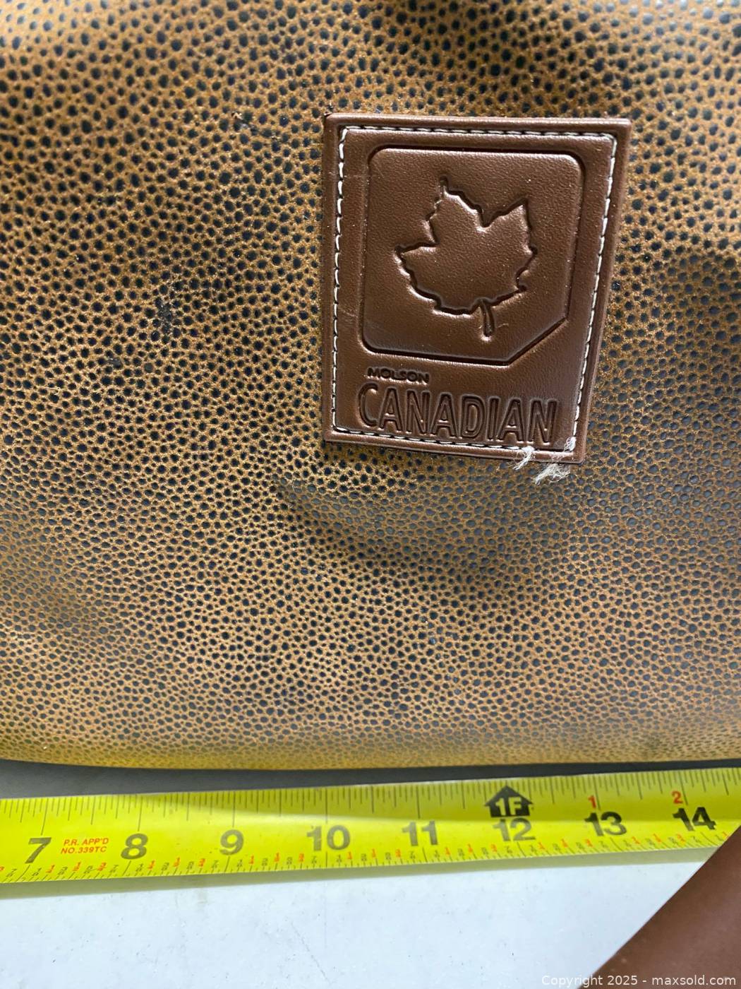 Molson Canadian vintage faux-leather duffel bag | Maxsold