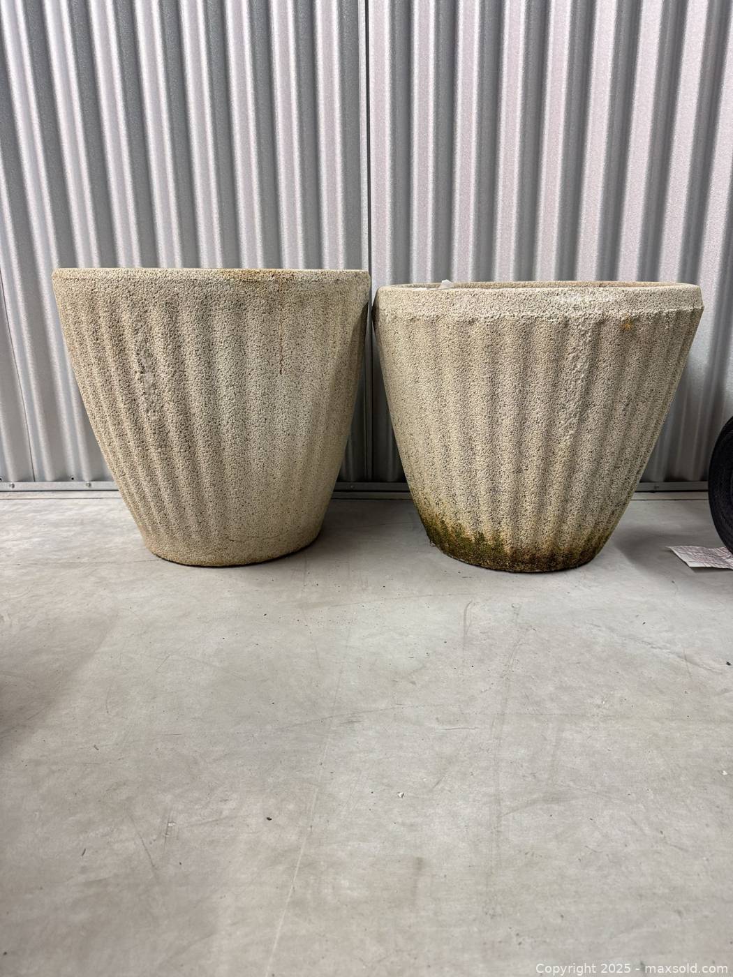 Pair Italian-made fluted outdoor planters | Maxsold