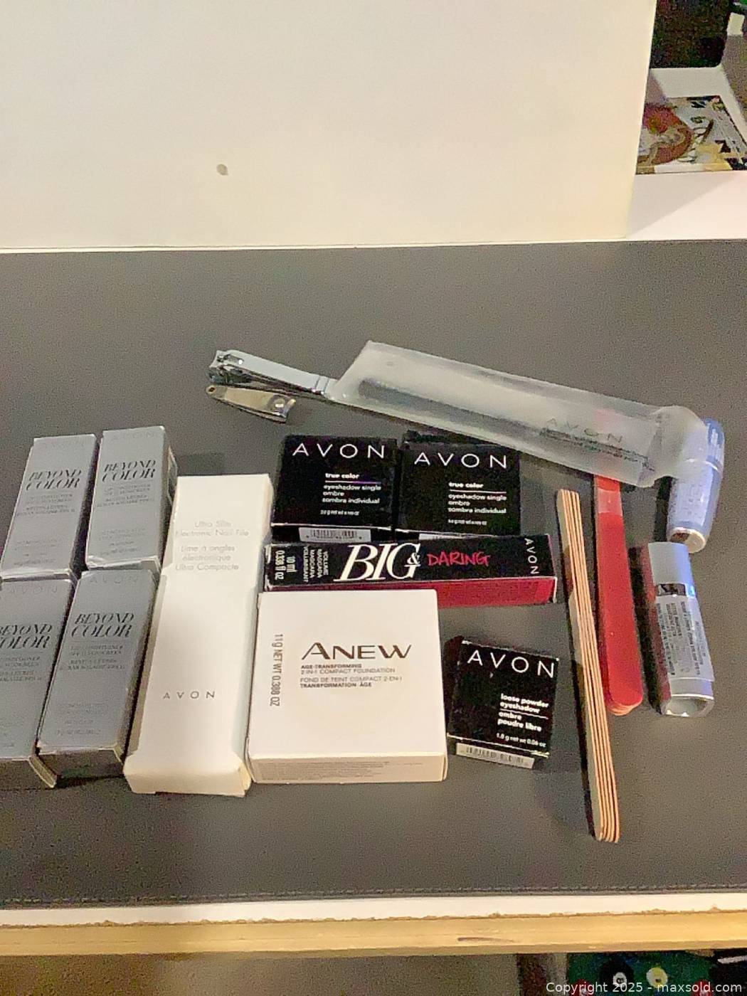 Avon cosmetics and manicure tools | Maxsold