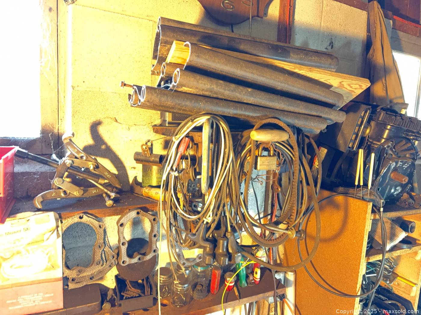 Workbench contents with cast iron vise and hardware | Maxsold