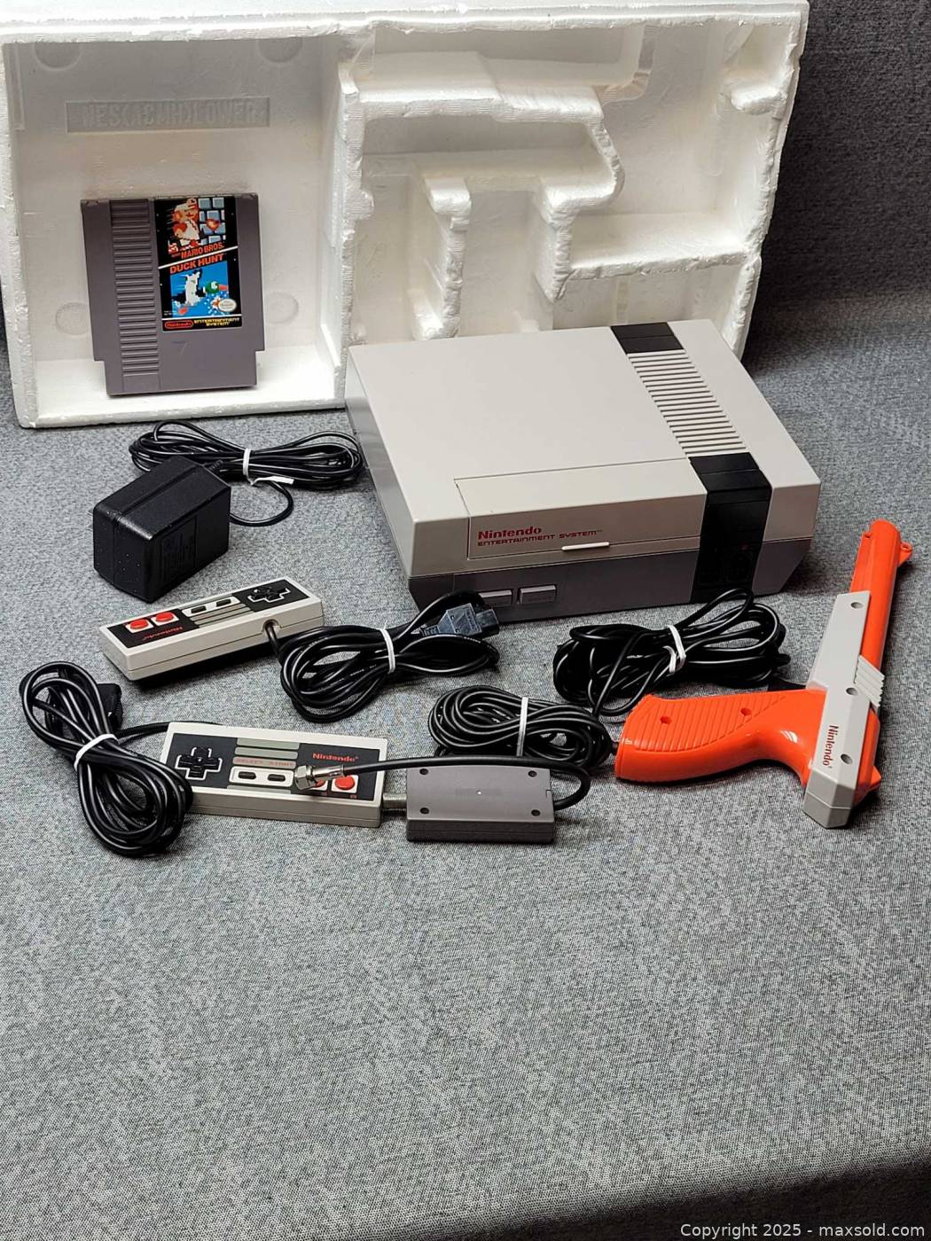 Nintendo NES Action Set with Mario Paint | Maxsold