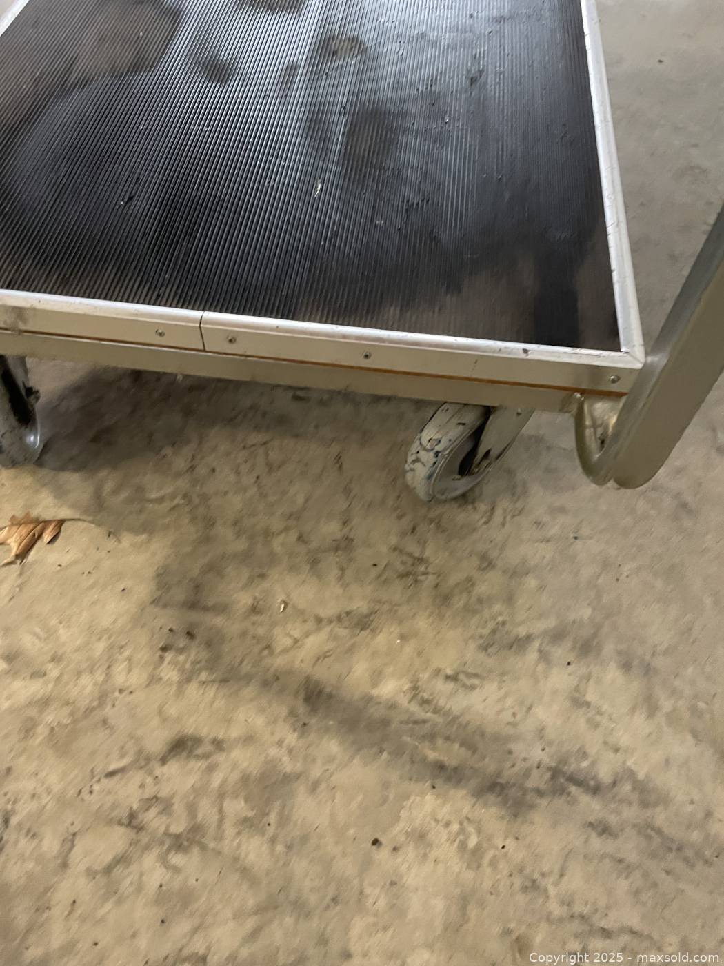Stainless steel two-shelf shop cart on casters | Maxsold
