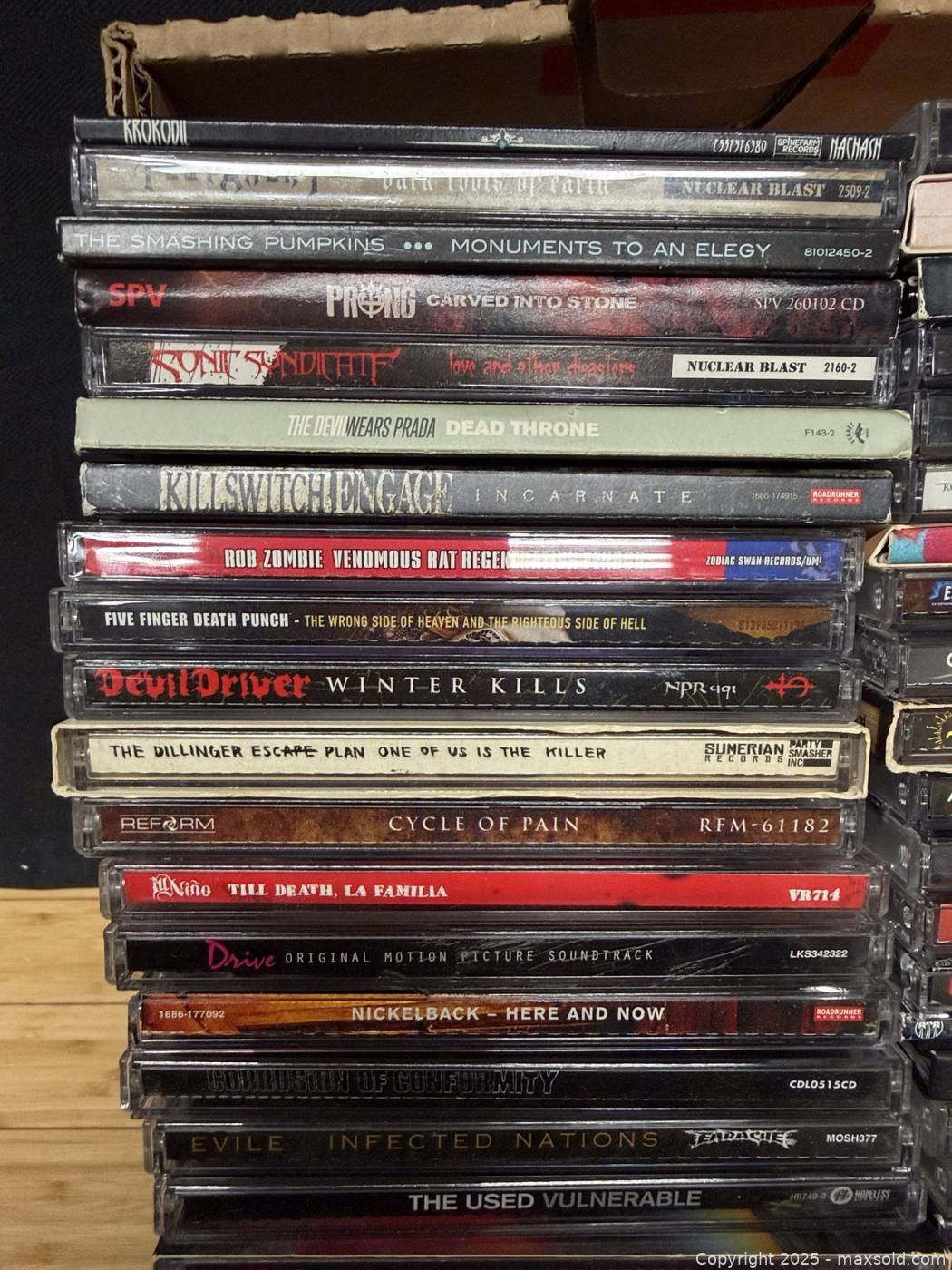 Over 100 heavy metal & hard rock CDs | Maxsold