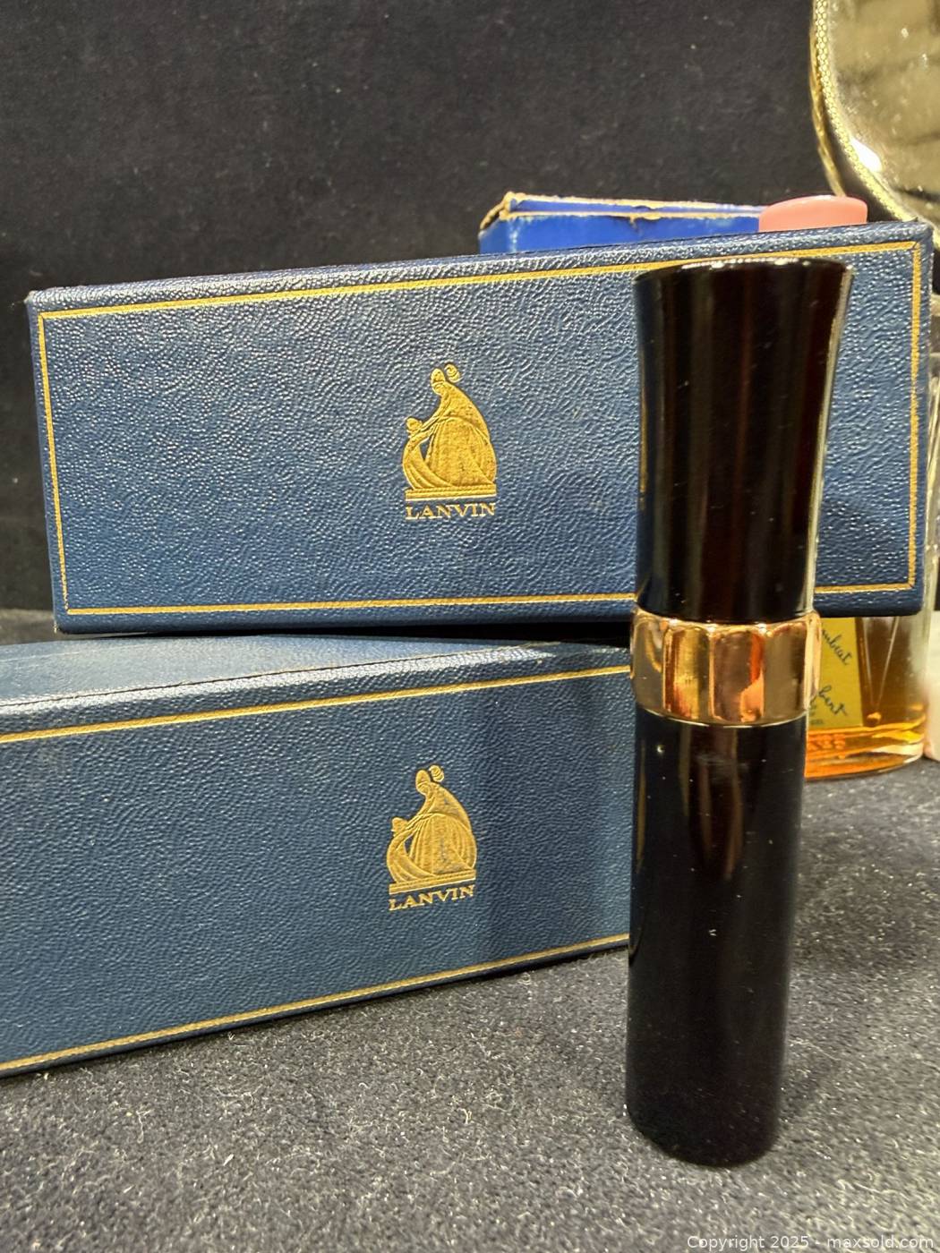 Vanity mirror with Lanvin perfume atomizer and assorted vintage perfume ...
