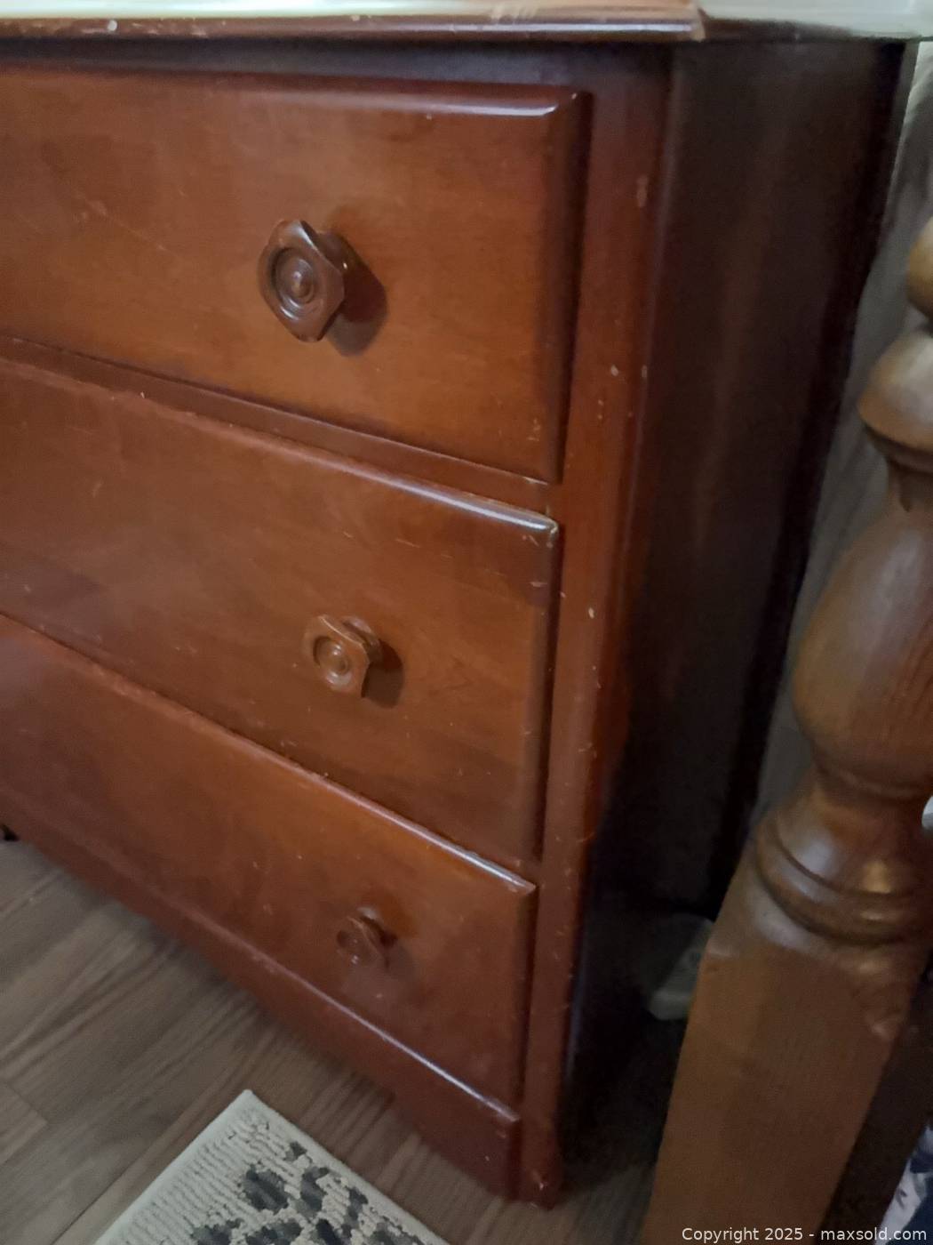 Solid wood 3-drawer dresser with carved knobs | Maxsold