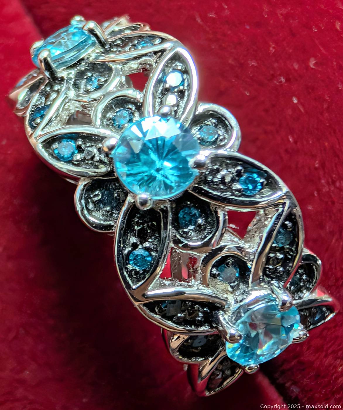 Silver blue zircon and blue diamond ring | Maxsold