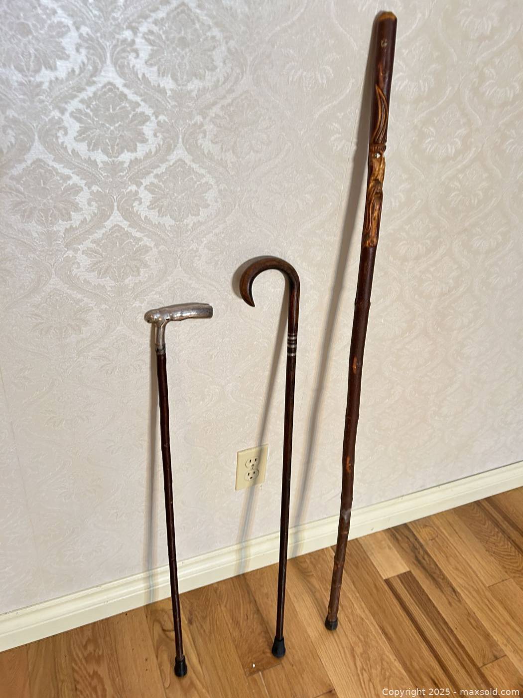 Lot of 3 mixed wood and metal walking canes | Maxsold