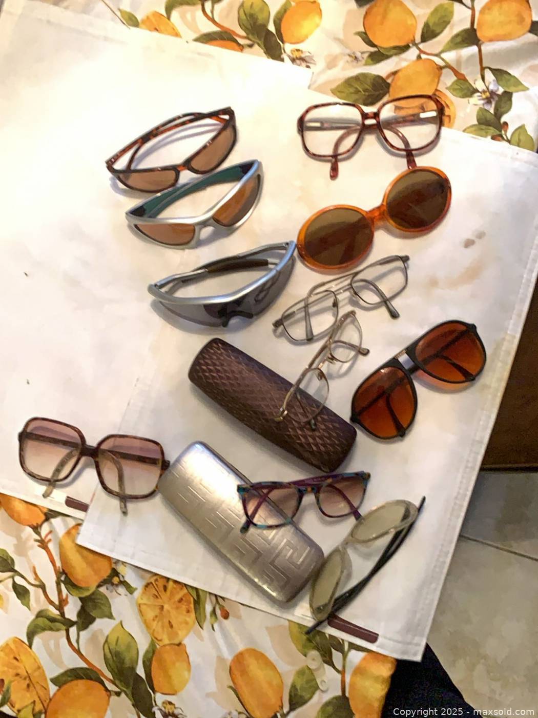 Assorted sunglasses and eyeglasses with cases | Maxsold