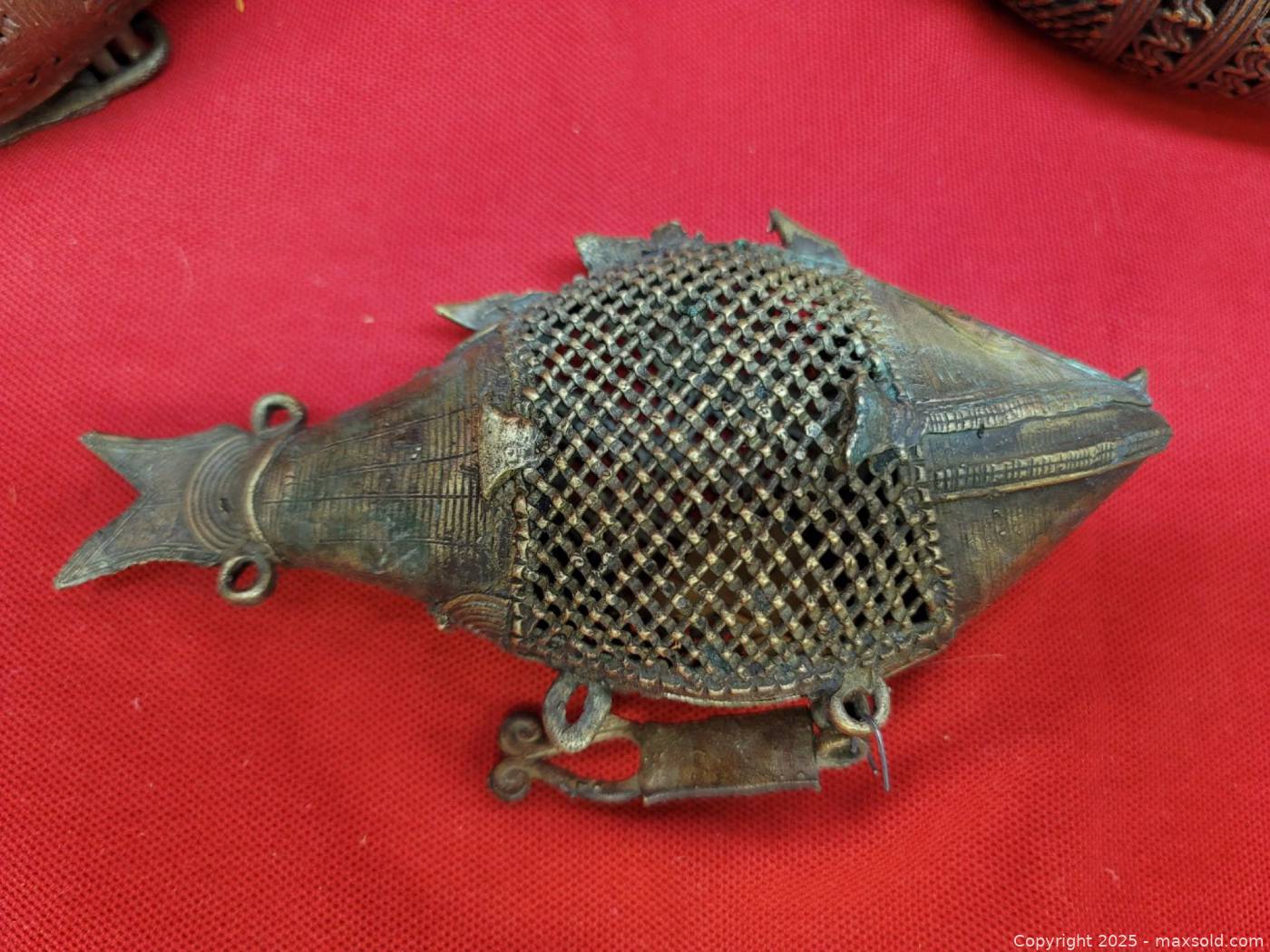Three brass Dhokra fish cricket cages | Maxsold