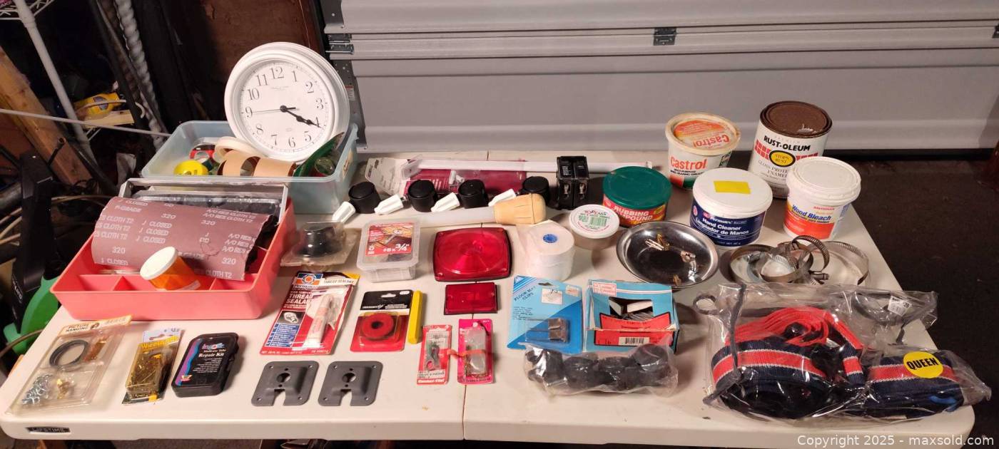 Assorted handyman hardware, clock, joint compound, straps | Maxsold