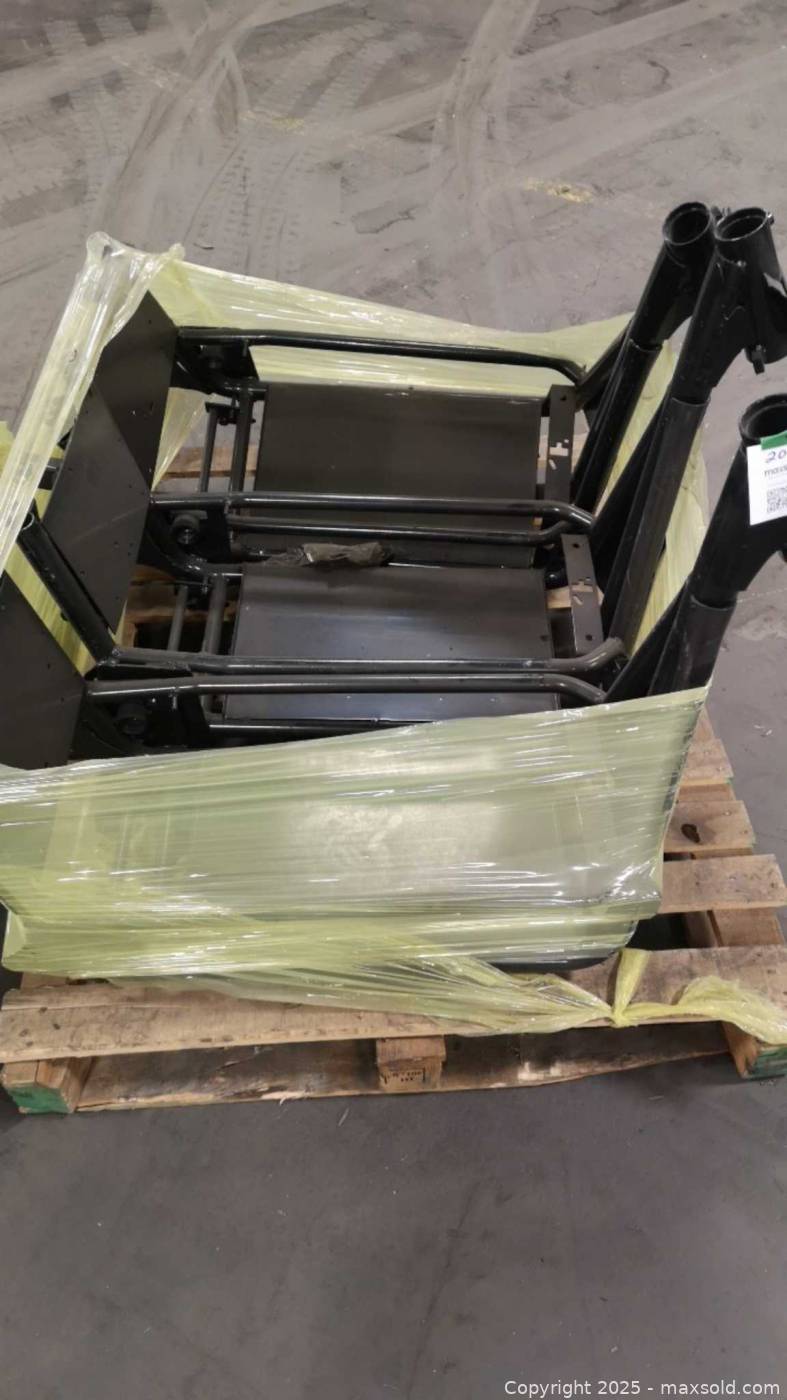Pallet lot of new black powder-coated steel frames, handlebars, loose ...