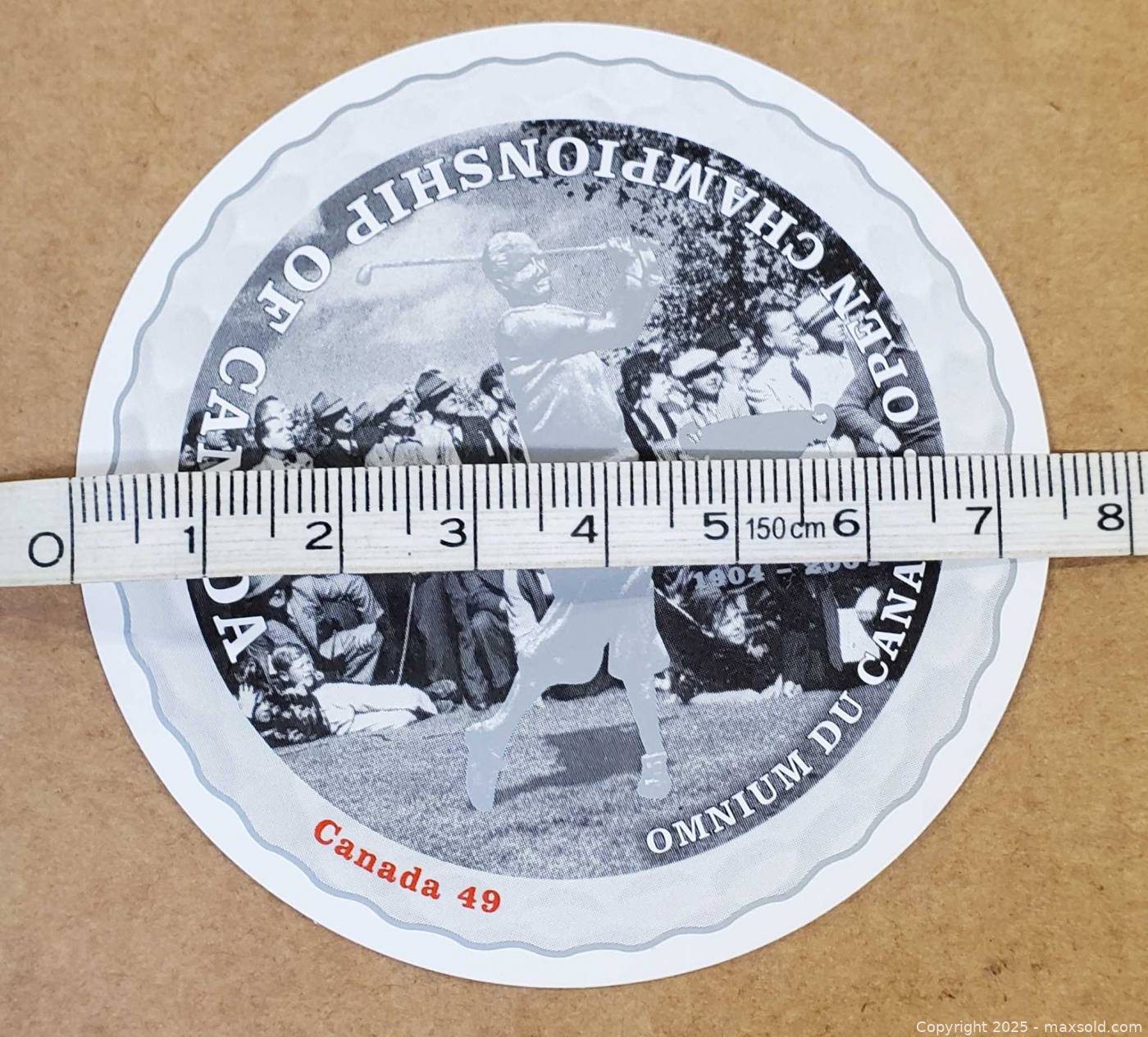 Canadian Open round souvenir tokens, 2 pieces | Maxsold