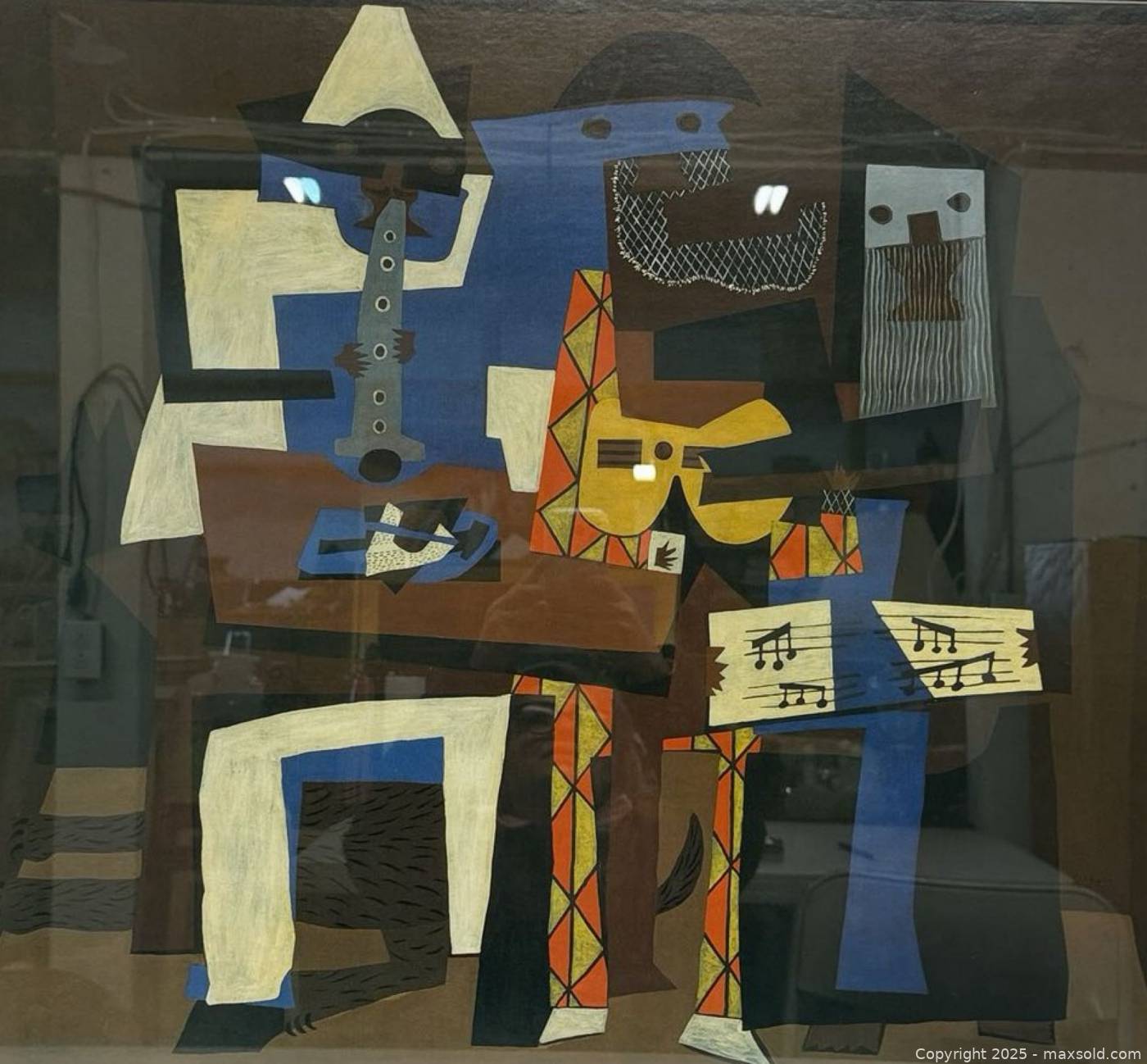 Framed Pablo Picasso “Three Musicians” print | Maxsold