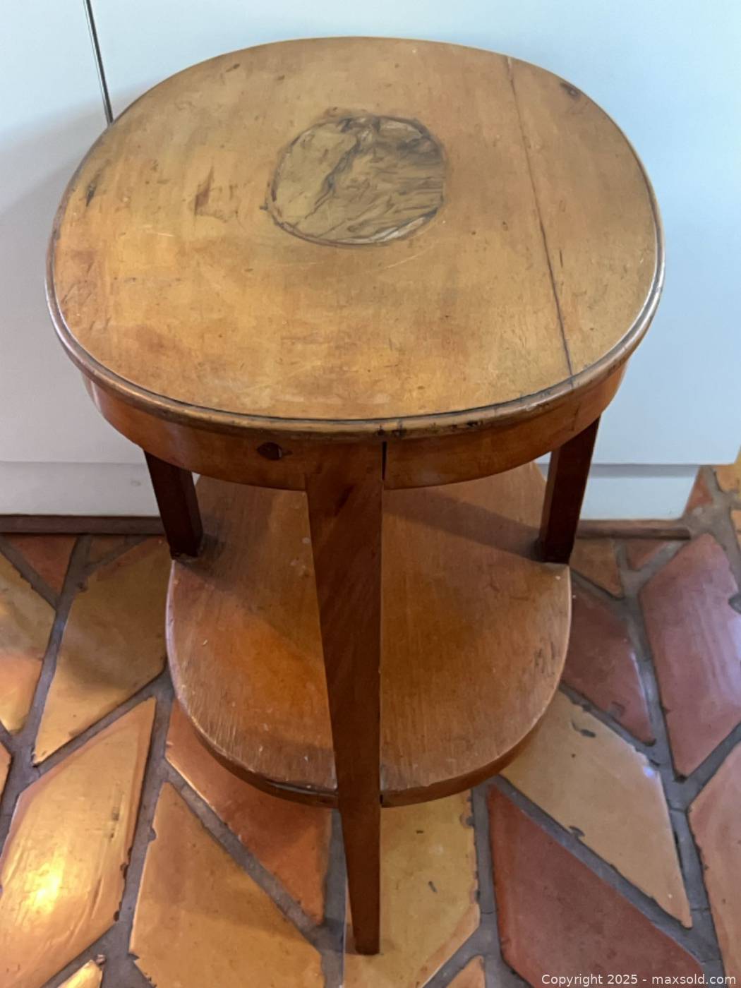 Two Tier Oval Walnut Table | Maxsold