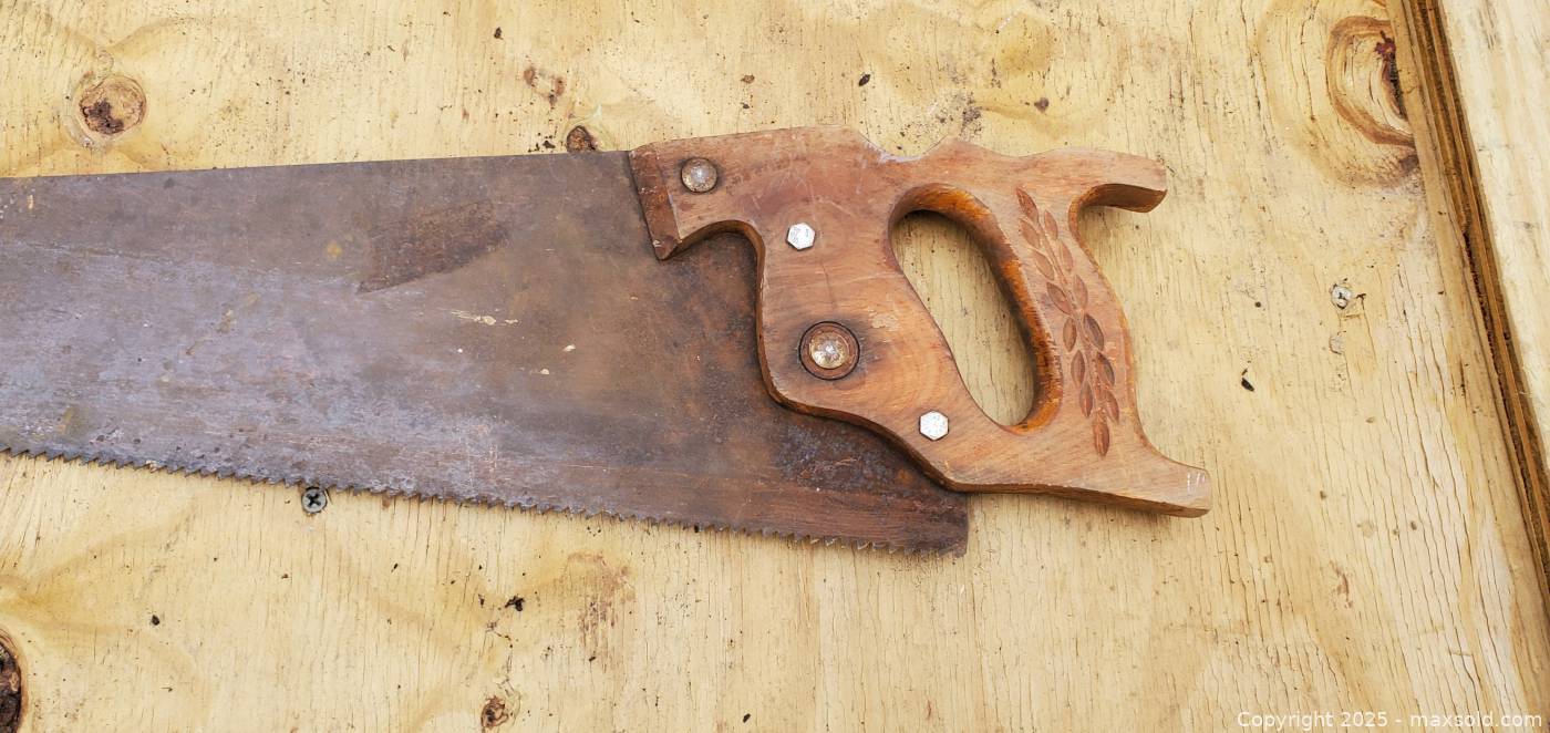 Vintage wood handle hand saw | Maxsold