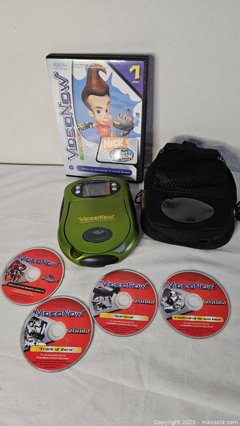 VideoNow personal video player with discs | Maxsold