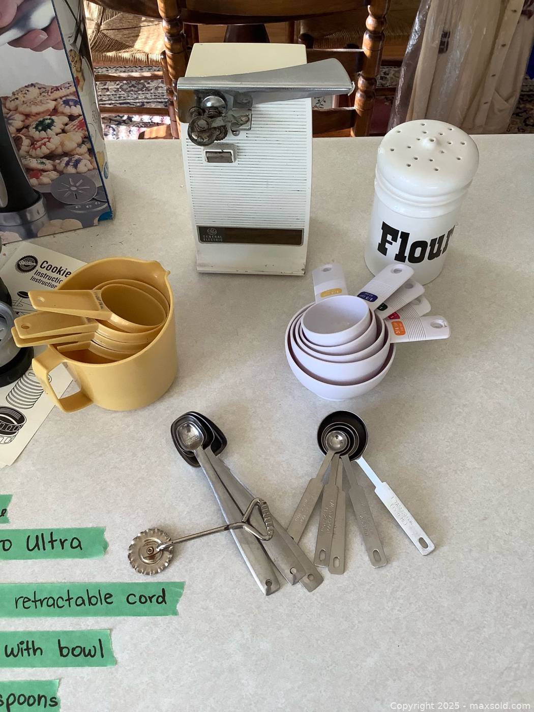 General Electric mixer, can opener, Wilton cookie press and kitchen ...