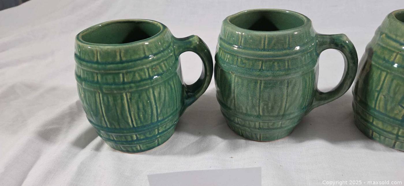 4 McCoy green barrel pottery mugs | Maxsold